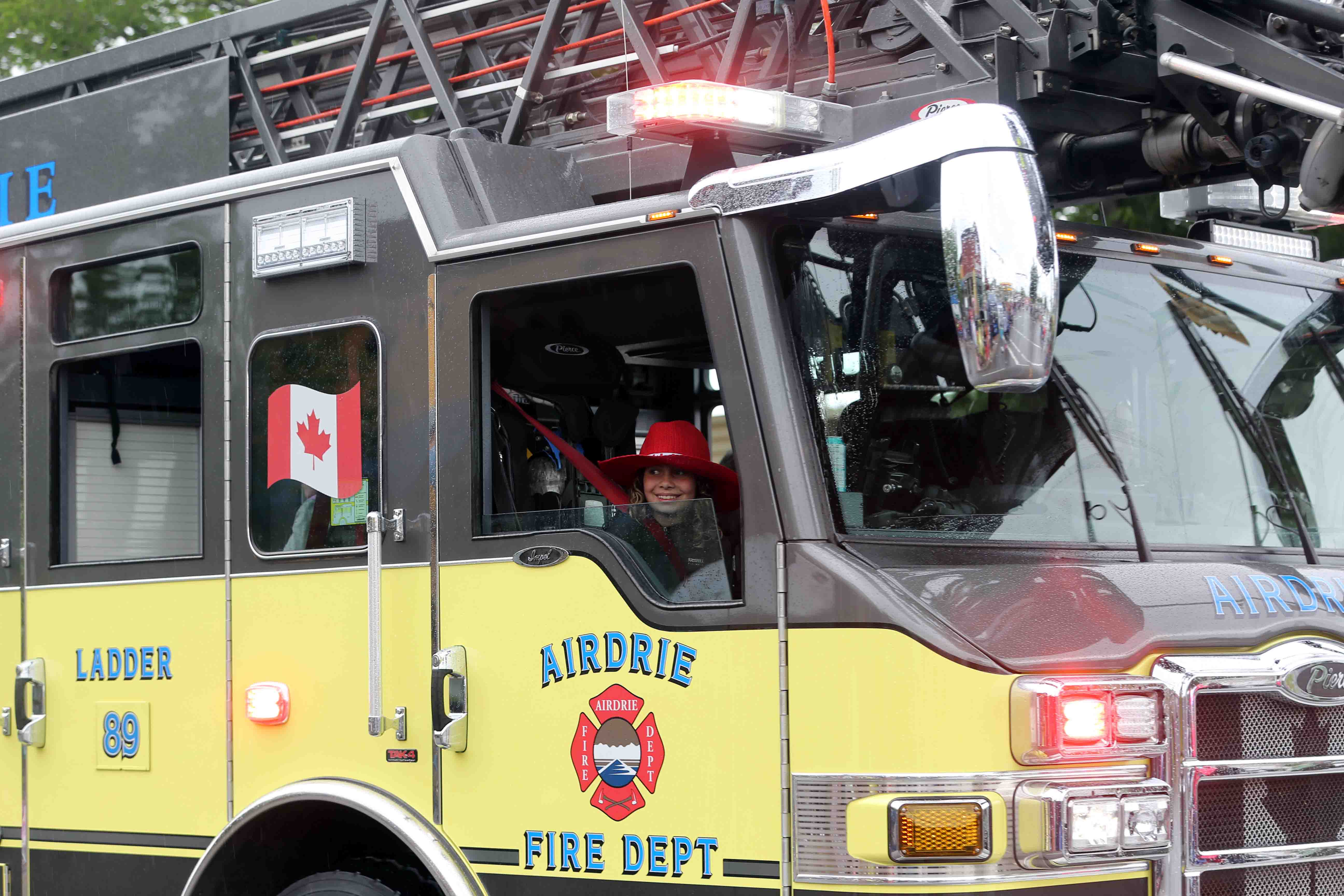 Watch / Gallery: Rain can't dampen Airdrie's Canada Day Parade ...