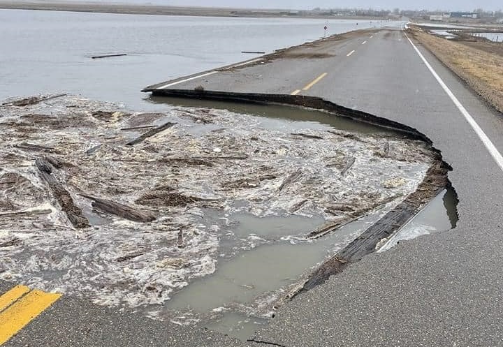 "A 15 foot drop": Highway craters revealed as flood waters recede ...