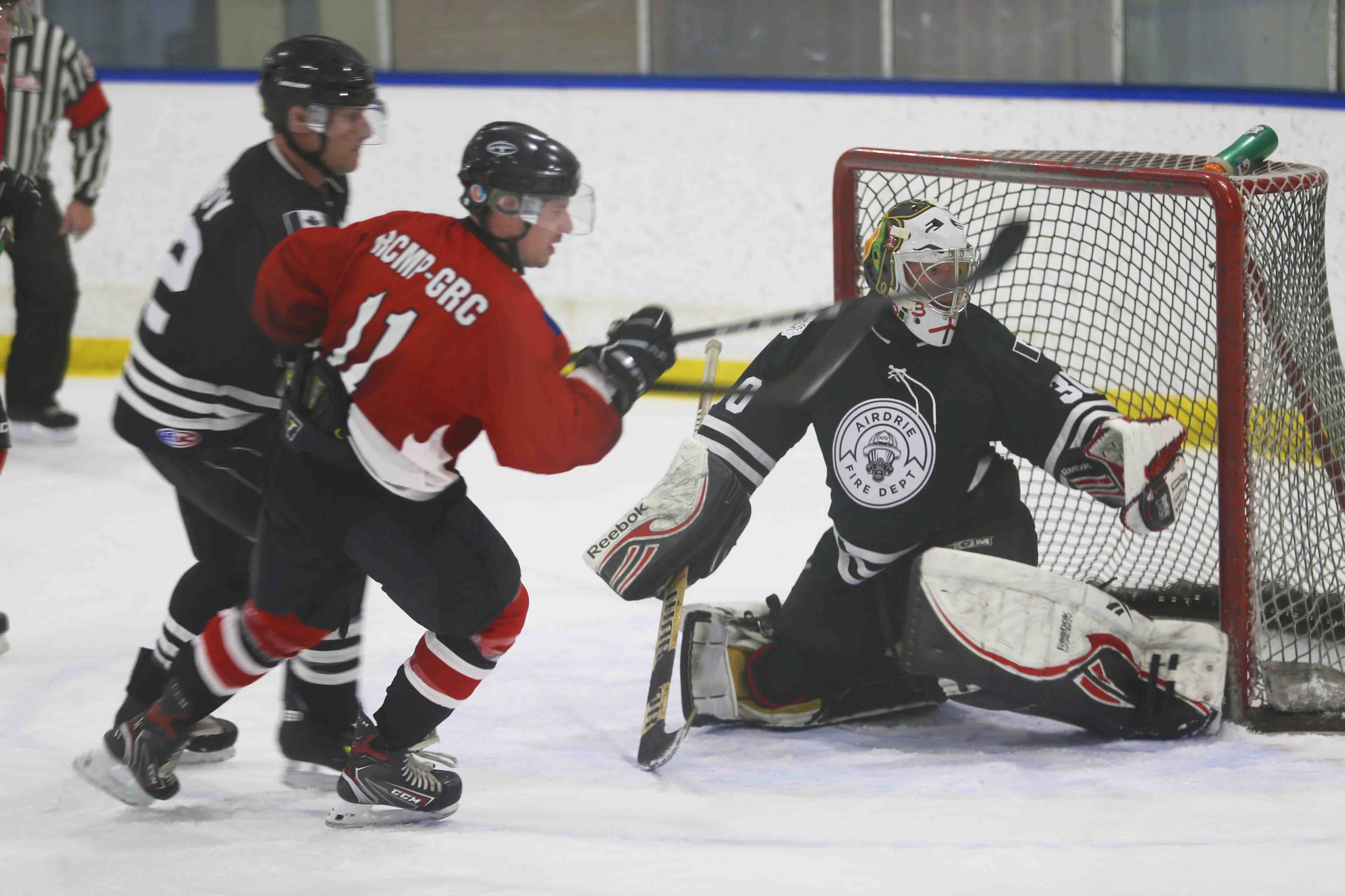 Watch / Gallery: Airdrie mounties come out blaring in Sirens hockey ...