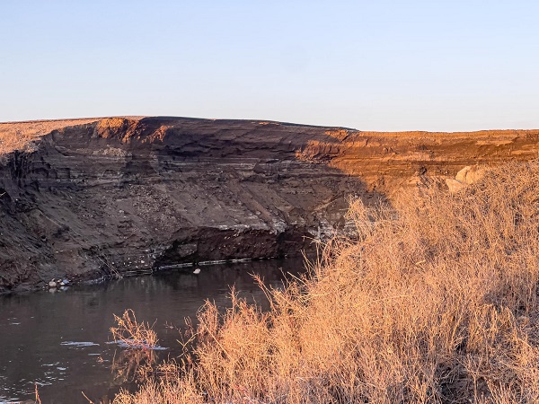 "A 15 foot drop": Highway craters revealed as flood waters recede ...